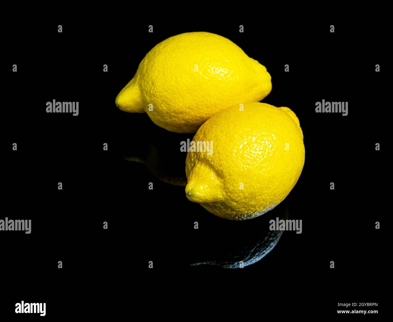 Citrus fruit yellow lemon on a black background. Citrus fruits of lemon ...