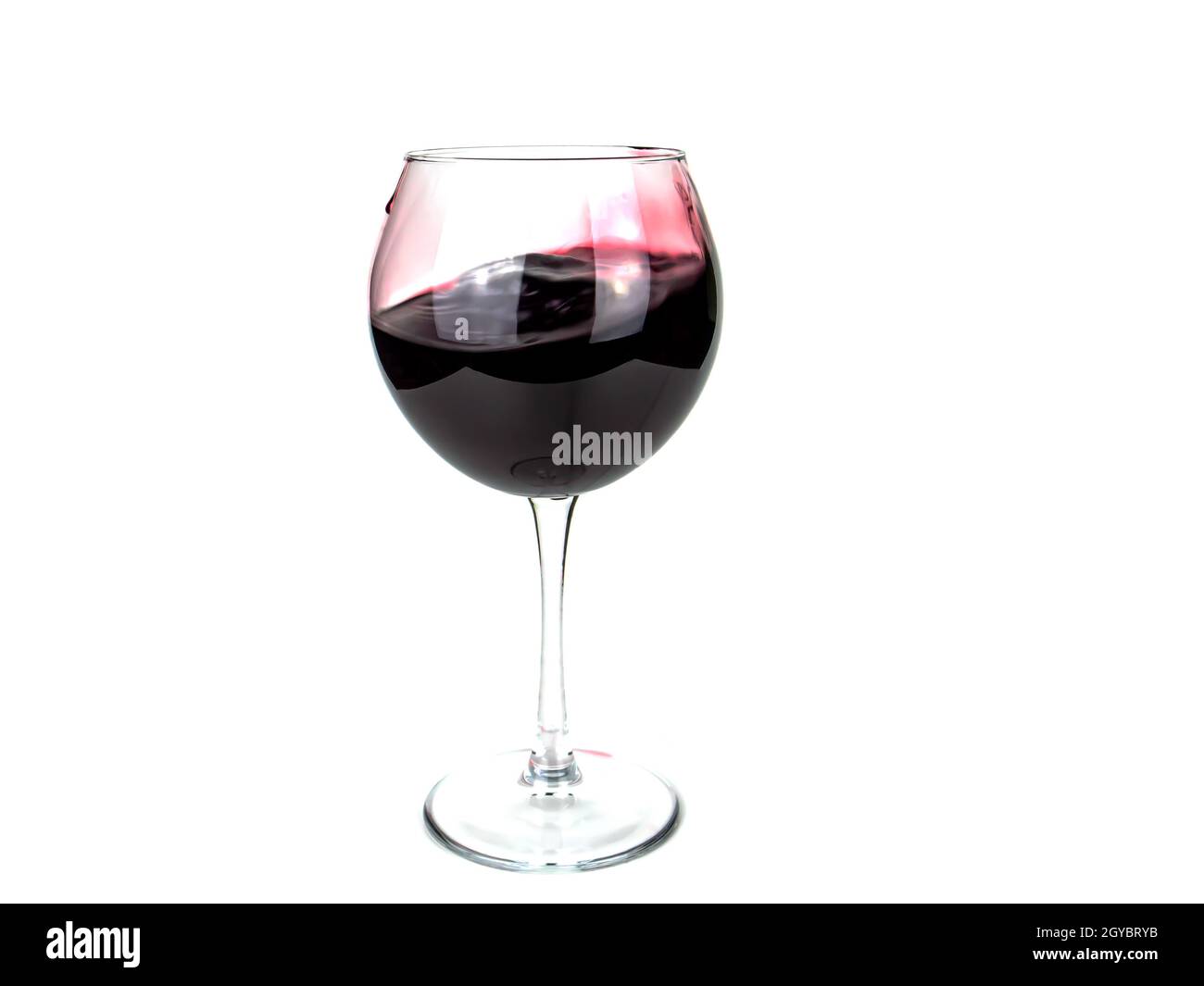 Glass goblet with red wine isolated on white background. Splash of wine ...