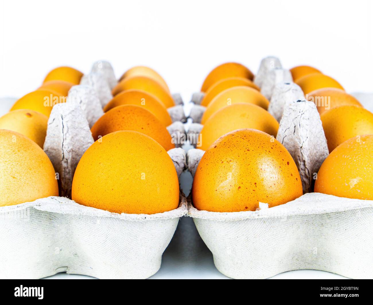 Brown chicken eggs in a carton box. Egg. Paper containers. Healthy food ...