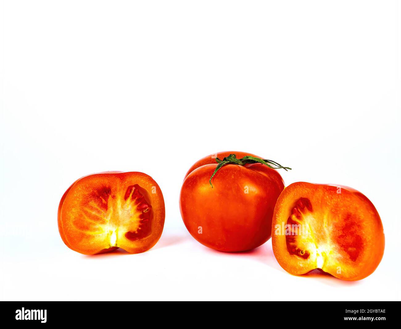 Red tomatoes vegetables on a white background. Red tomato vegetable ...