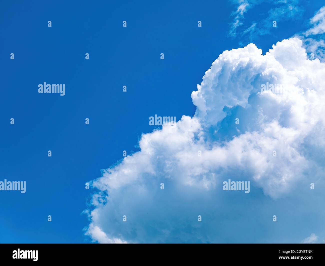 White cumulus cloud against the blue sky. White clouds. Blue sky ...