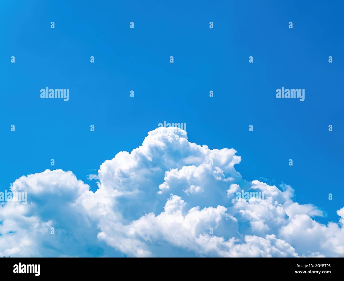 White cumulus clouds against the blue sky. White clouds. Blue sky ...