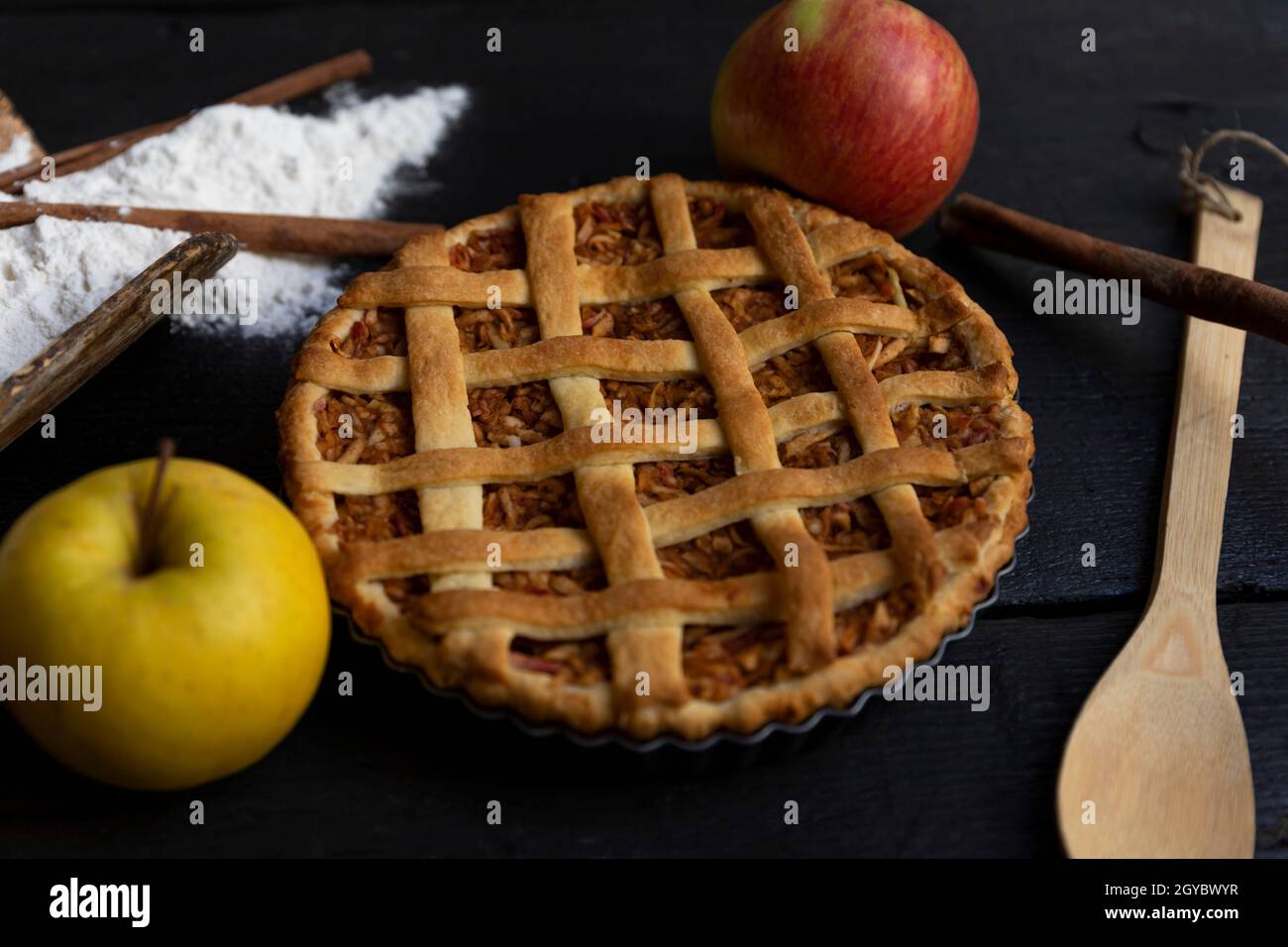 Homemade lattice Apple pie with cinnamon on an old textured wooden ...