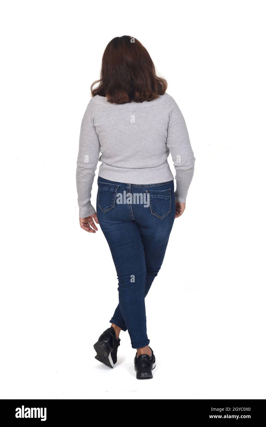 Hispanic woman crossed legs Cut Out Stock Images & Pictures - Alamy