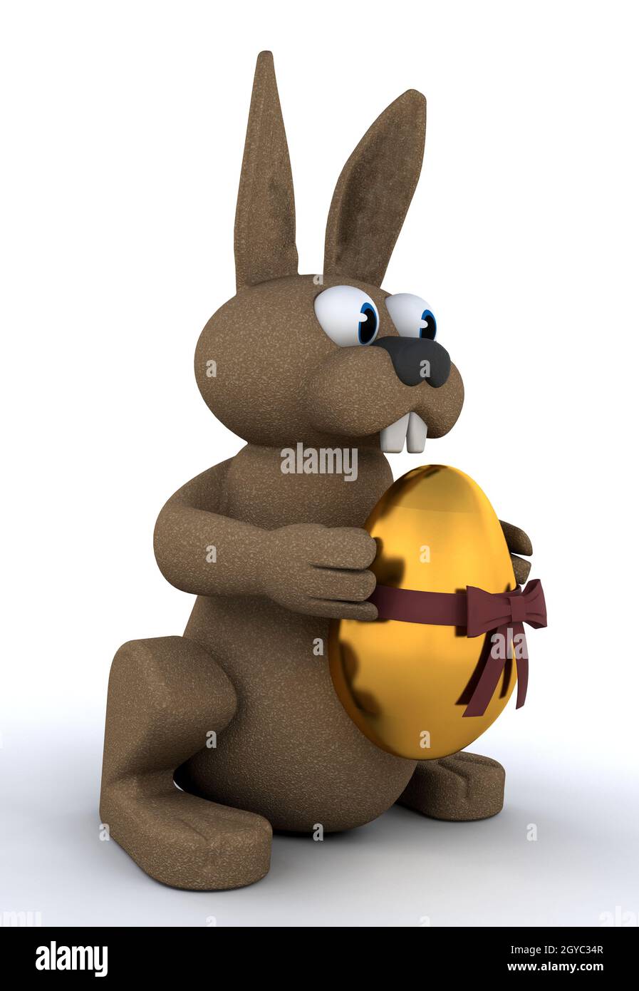Easter bunny holding a golden egg Stock Photo - Alamy