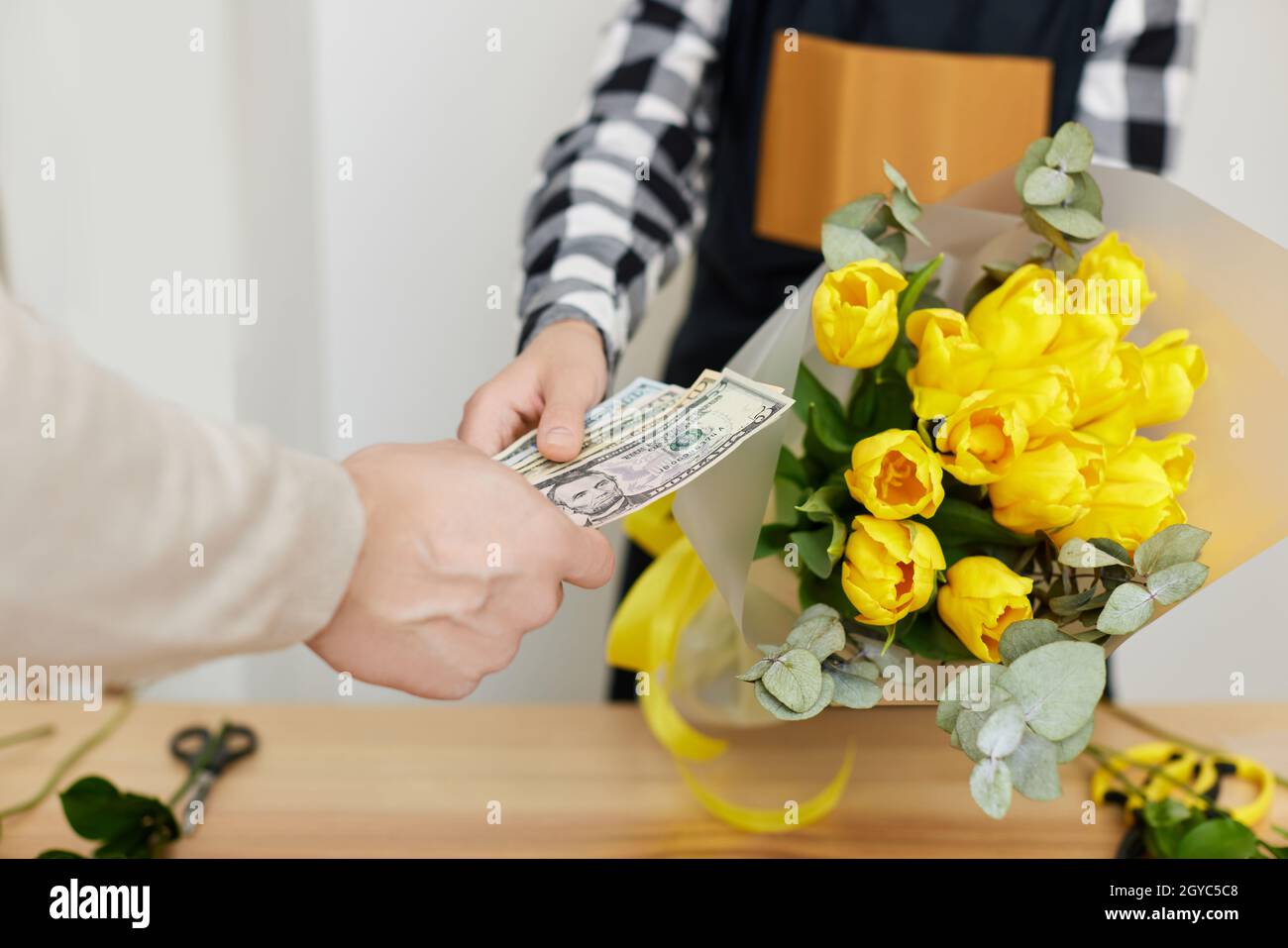 Woman hands holding giving flowers hi-res stock photography and images ...