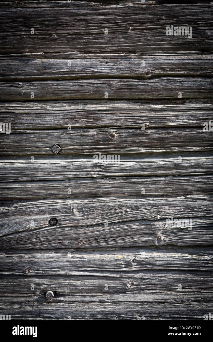 Wooden logs of an old house. Close-up. Weathered natural gray wood ...