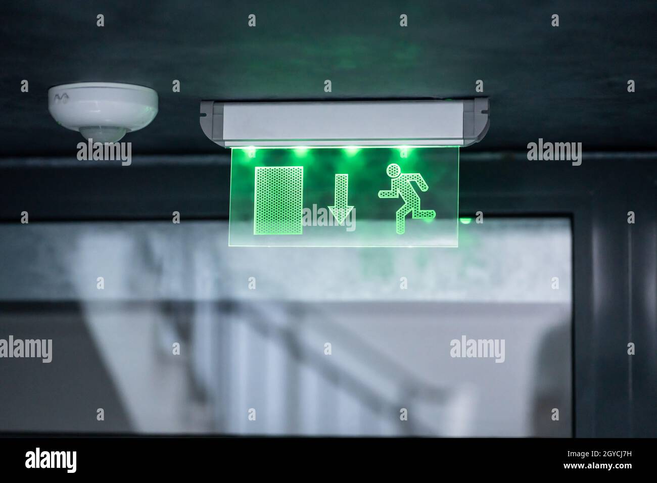Emergency Evacuation Exit Sign. Fire Escape Guide Stock Photo - Alamy