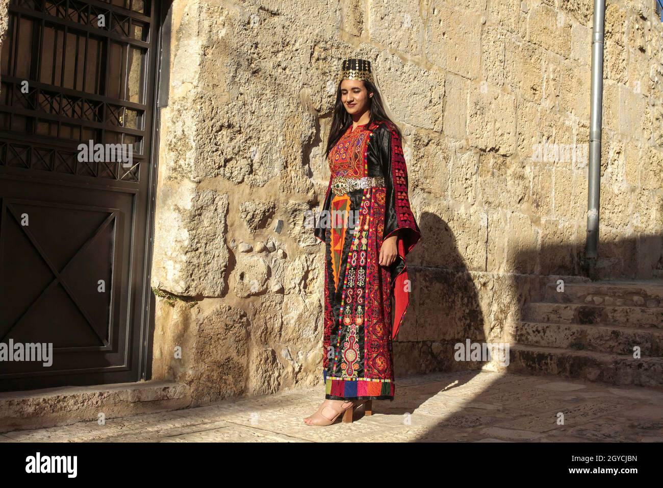 A Palestinian woman seen wearing the old Palestinian traditional dress ...