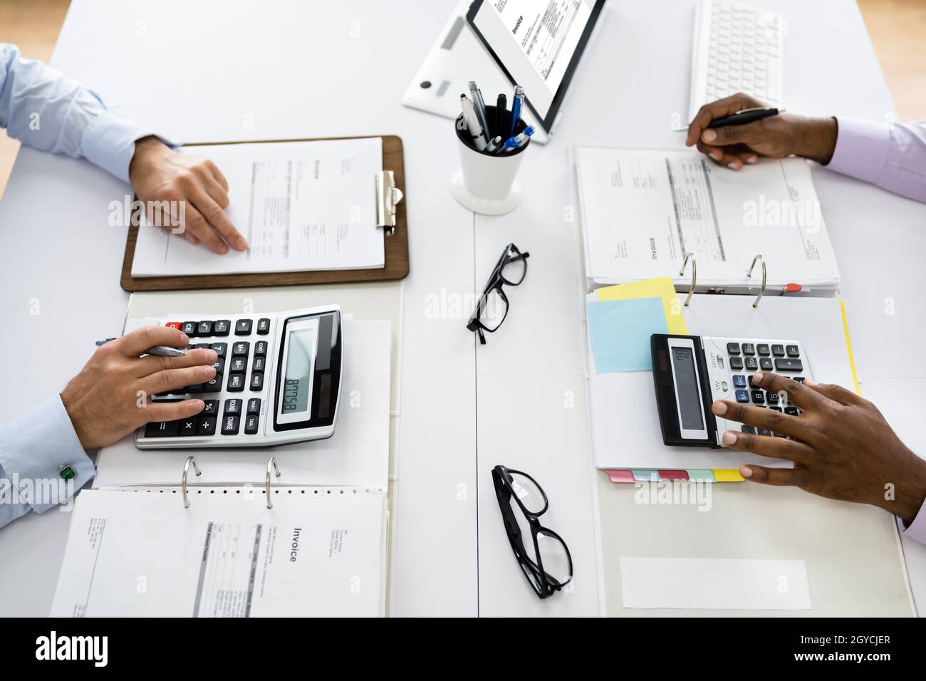 Tax Accountant And Auditor With Receipts. Overhead View At Desk Stock ...