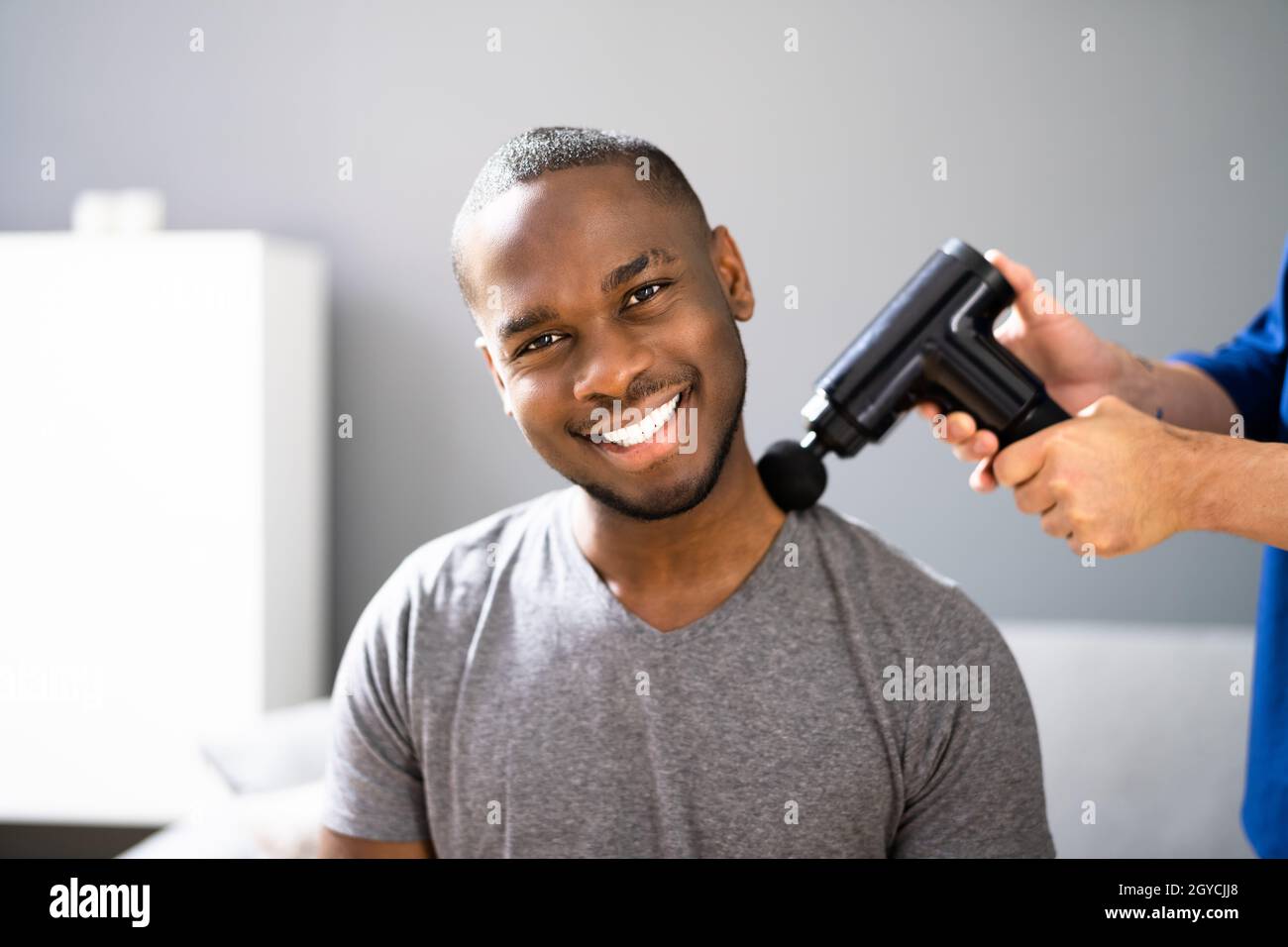 Massage gun machine muscle hi-res stock photography and images - Alamy
