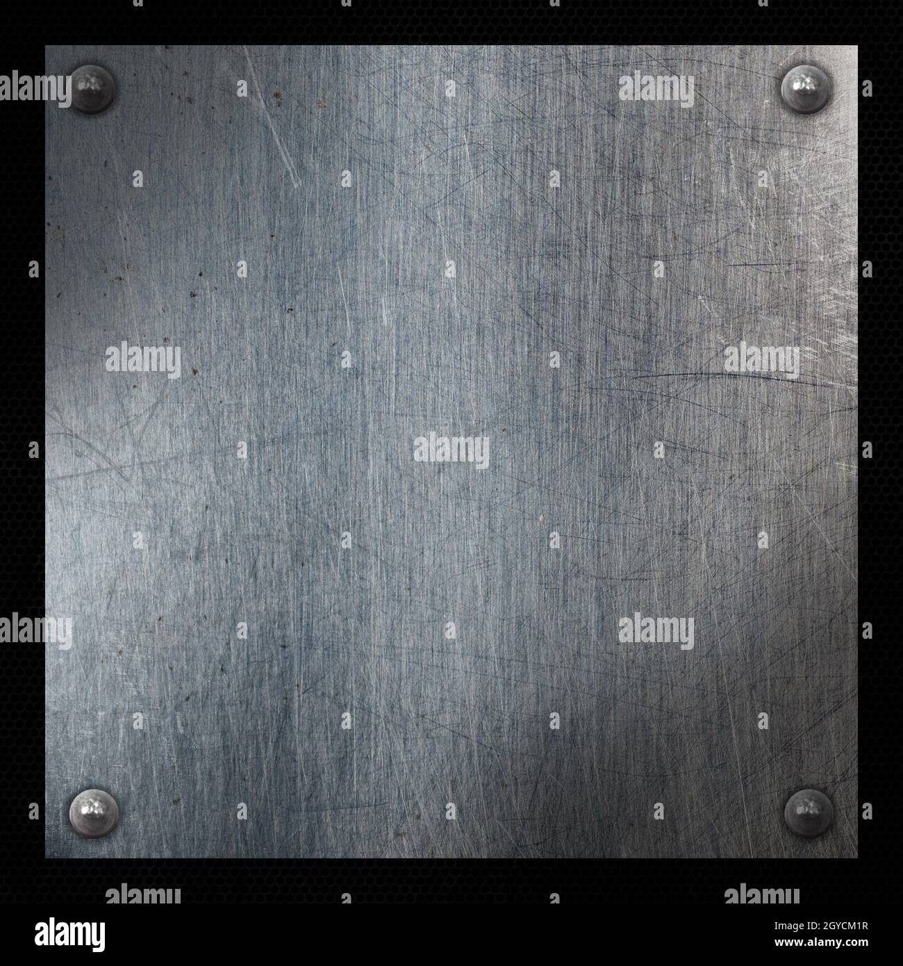 Scratched metal plate on a grunge perforated background Stock Photo - Alamy