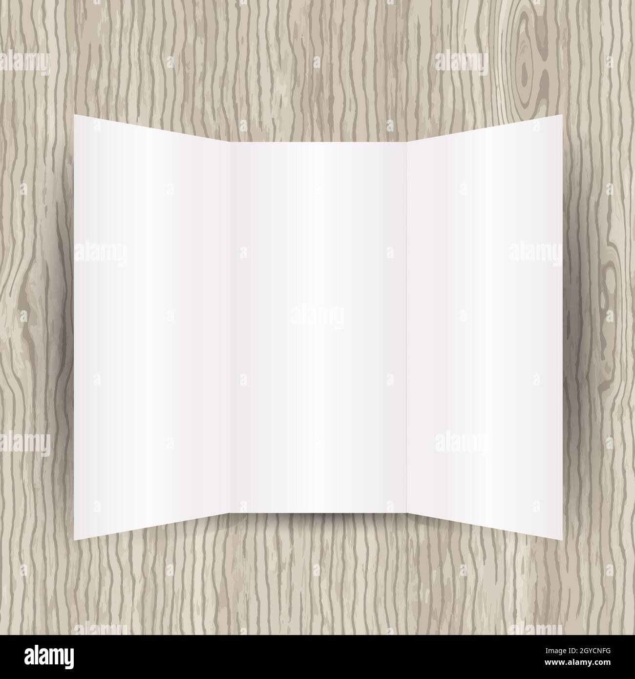 Blank tri fold leaflet on a wood background Stock Photo - Alamy