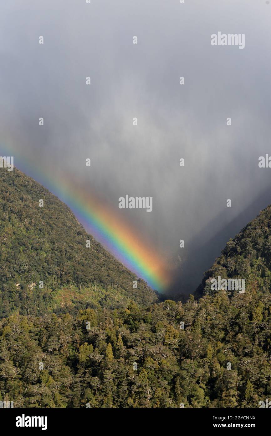 Spectacular rainbow in Fiordland New Zealand Stock Photo - Alamy