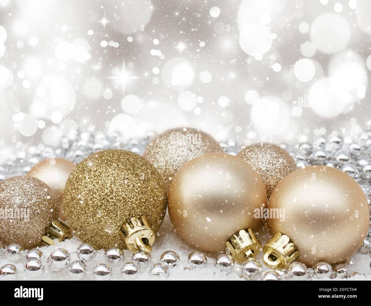 Christmas background with gold baubles Stock Photo - Alamy