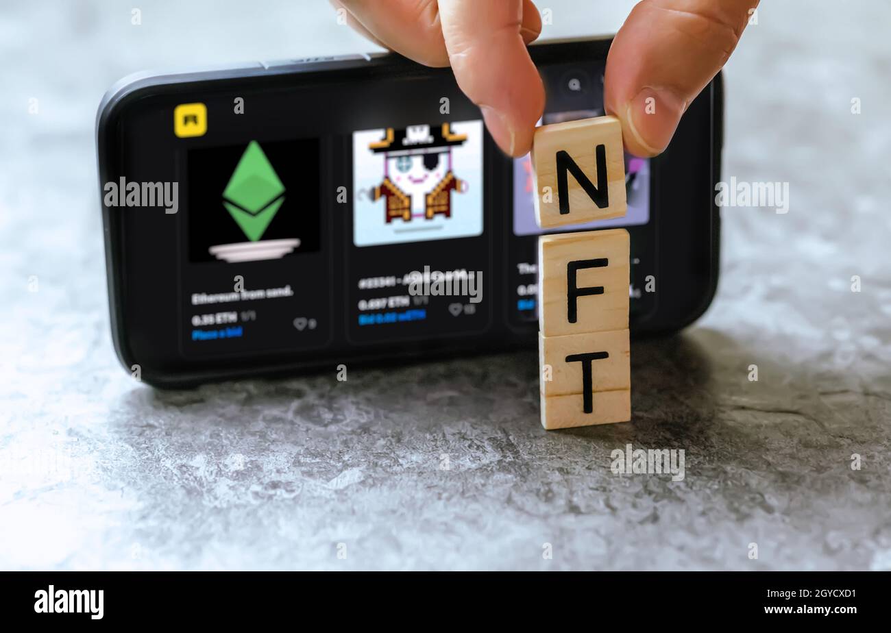 Vienna Austria June.5 2021: NFT or Non-Fungible token letters and dices ...