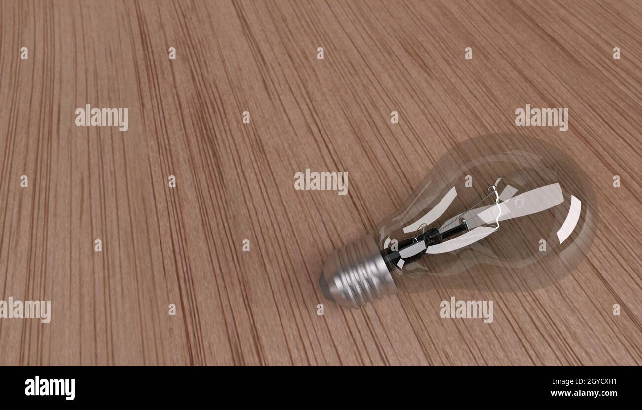 3d render of light bulb on wood background Stock Photo - Alamy