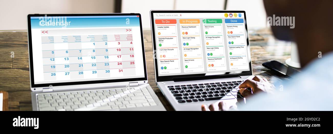 Calendar And Schedule List Chart On Multiple Computer Screens Stock ...