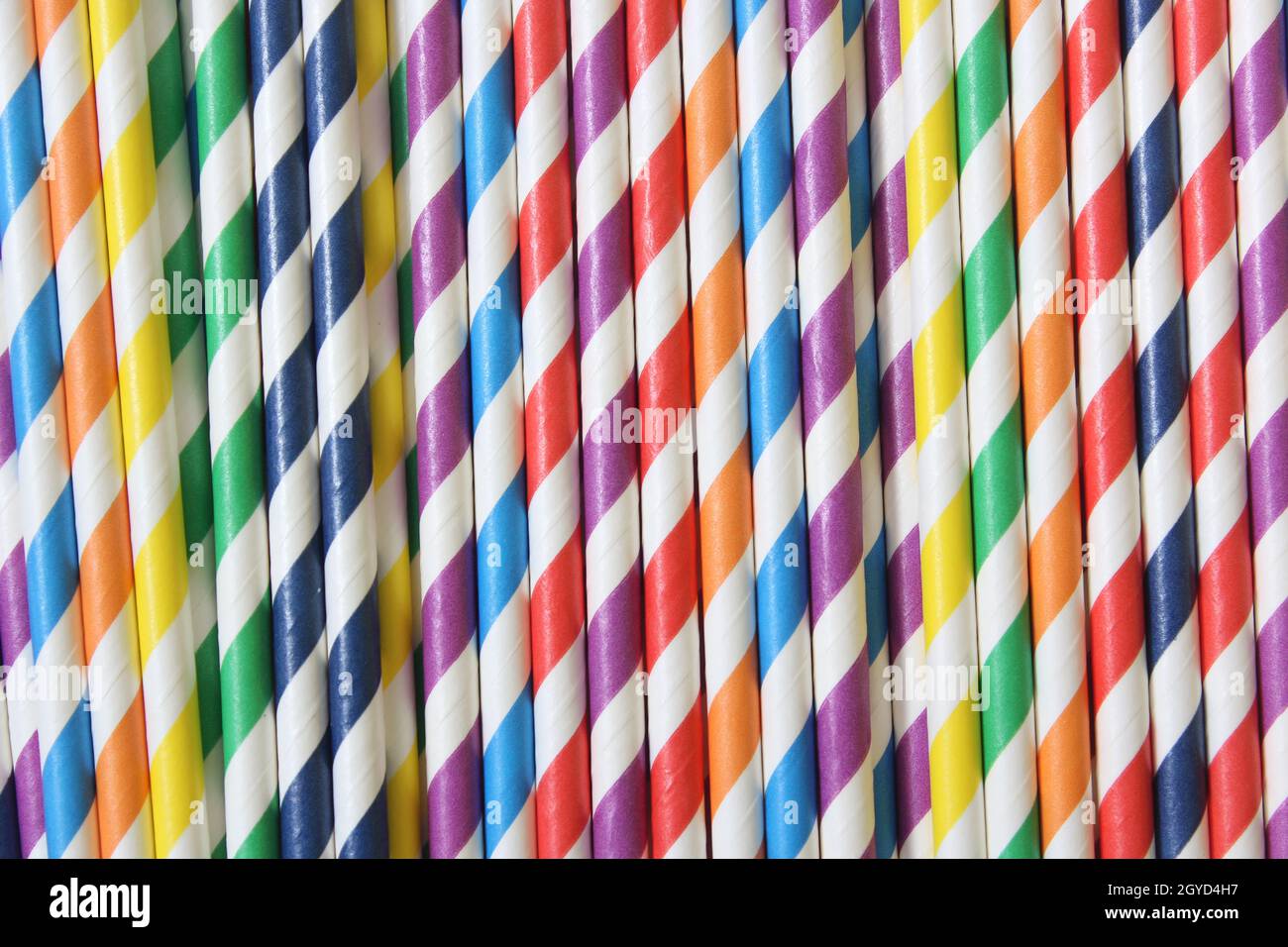 Colorful Striped Paper Straws Background Stock Photo - Alamy