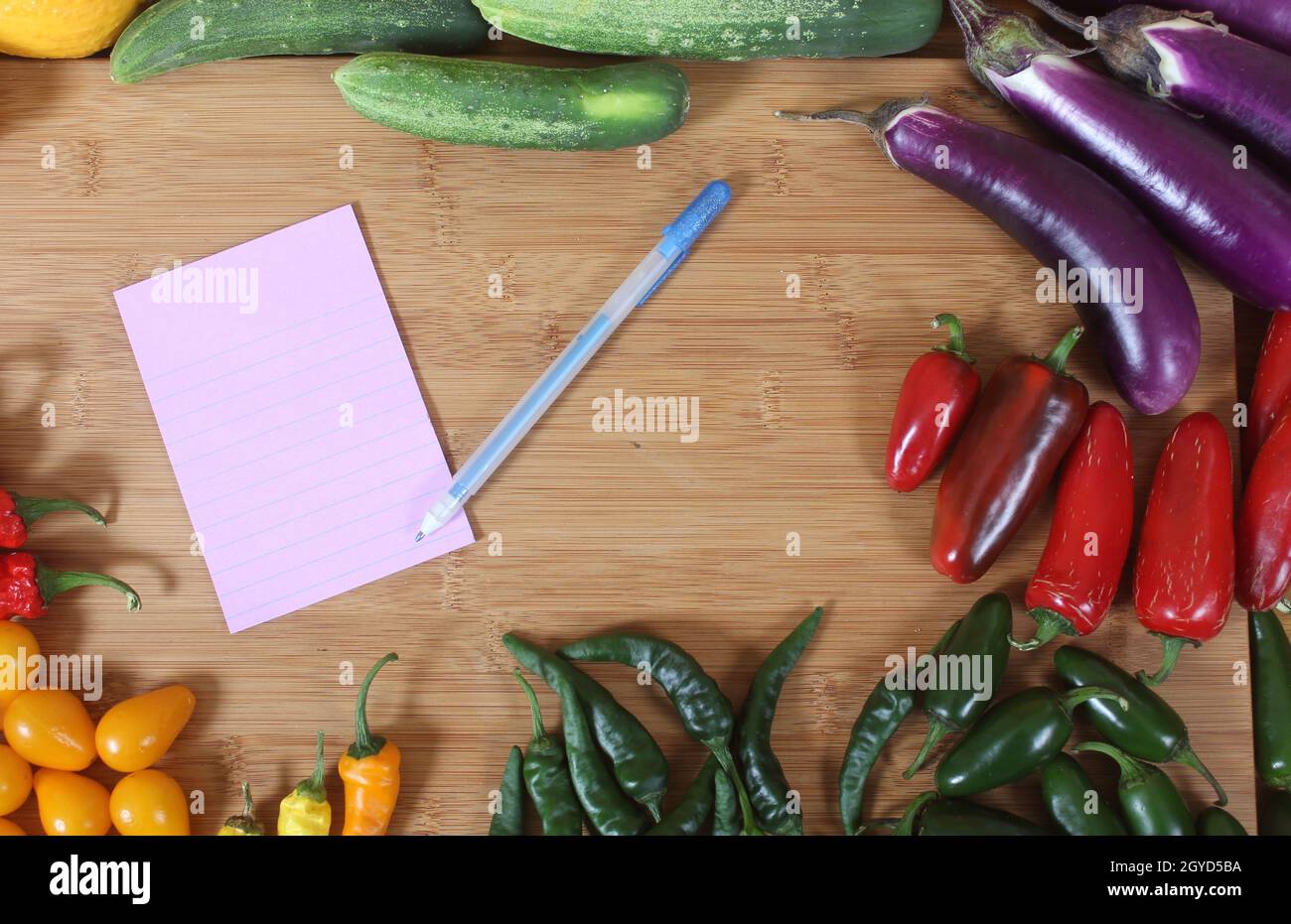 Organic Summer Vegetable Harvest on Table With Note Pape and Pen Stock ...