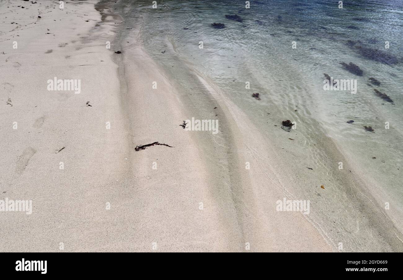 Beautiful shots of the white beach sand on the Seychelles paradise ...