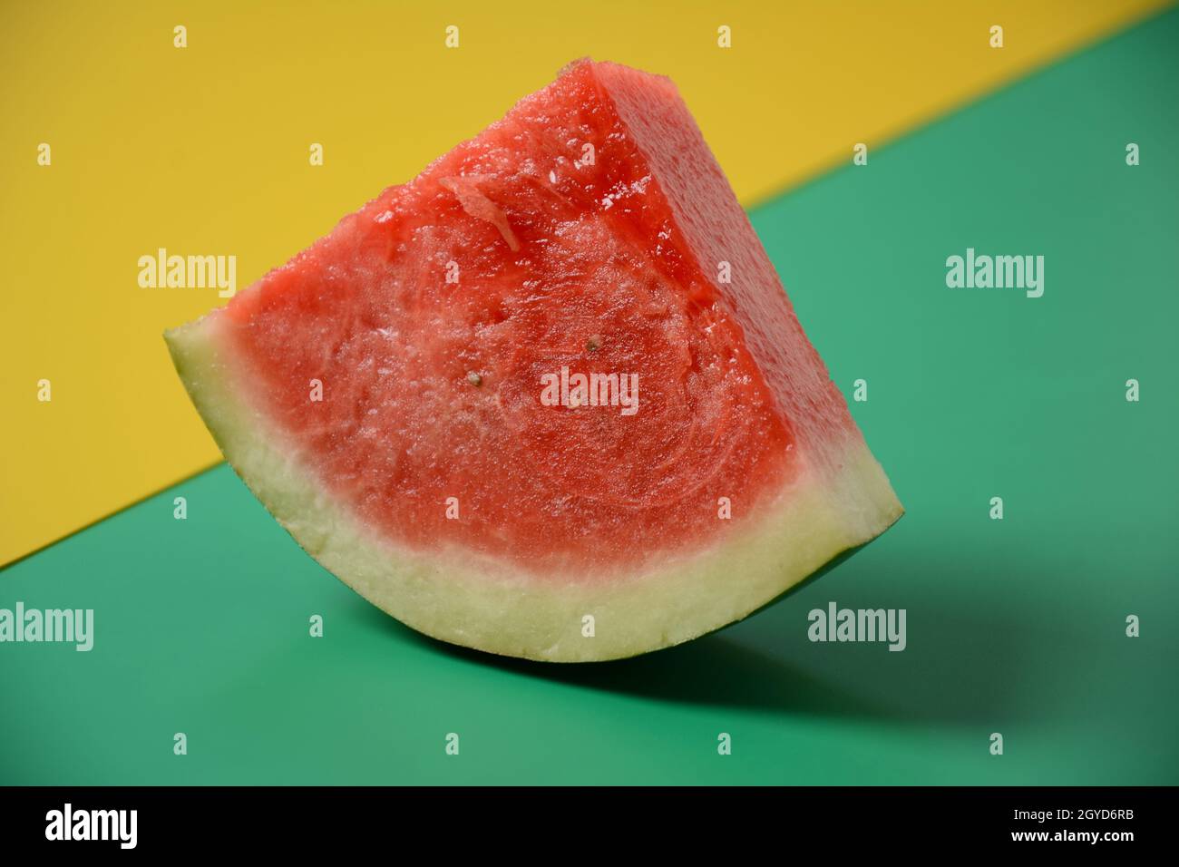 Fresh sliced watermelon piece on bright background Stock Photo - Alamy