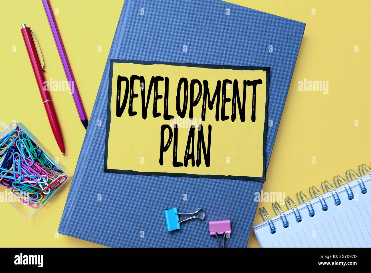 Sign displaying Development Plan, Business approach the planning of the ...