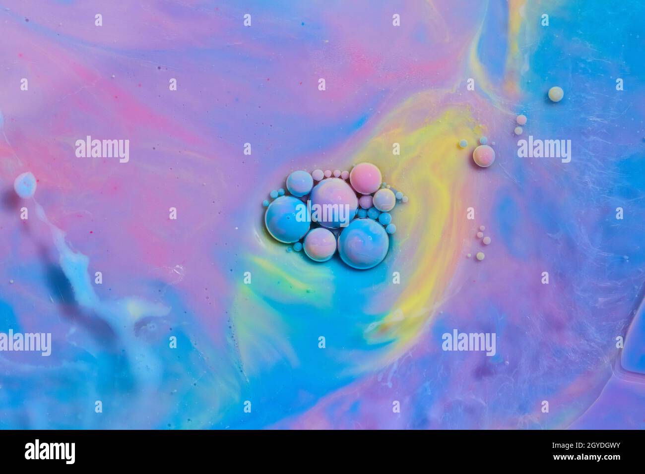 Colorful floating orbs on mystical unicorn colored smooth surface Stock ...