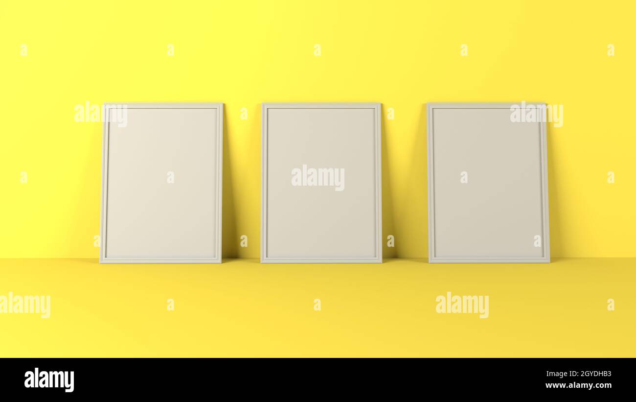 Render of 3D Blank Picture Frames on Empty Wall Stock Photo - Alamy