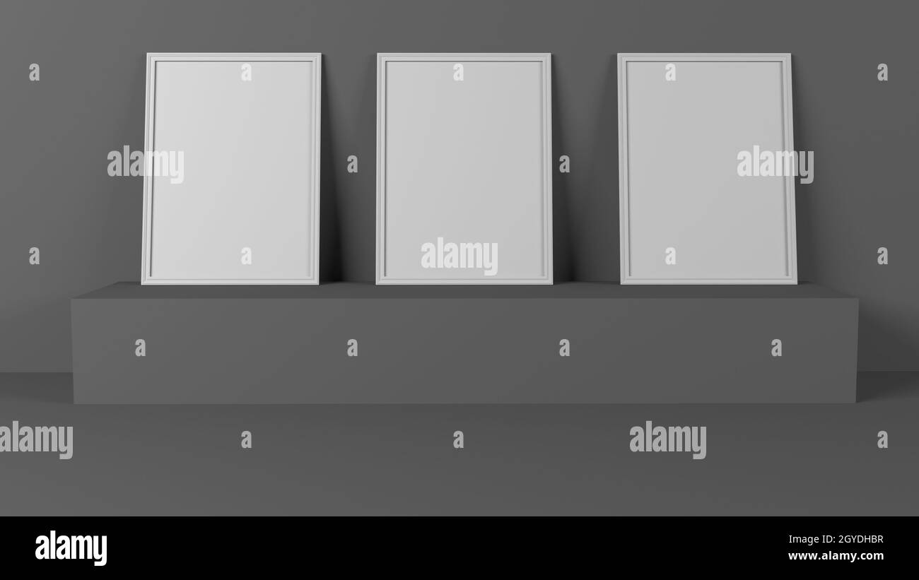 Render of 3D Blank Picture Frames on Empty Wall Stock Photo - Alamy