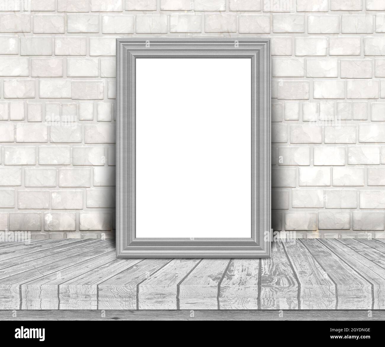 3D render of a blank silver picture frame on a wooden table leaning ...