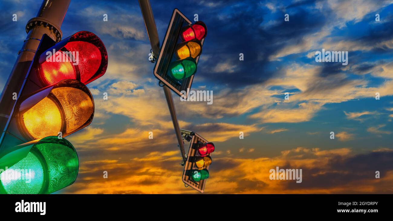 Traffic lights over urban intersection Stock Photo - Alamy