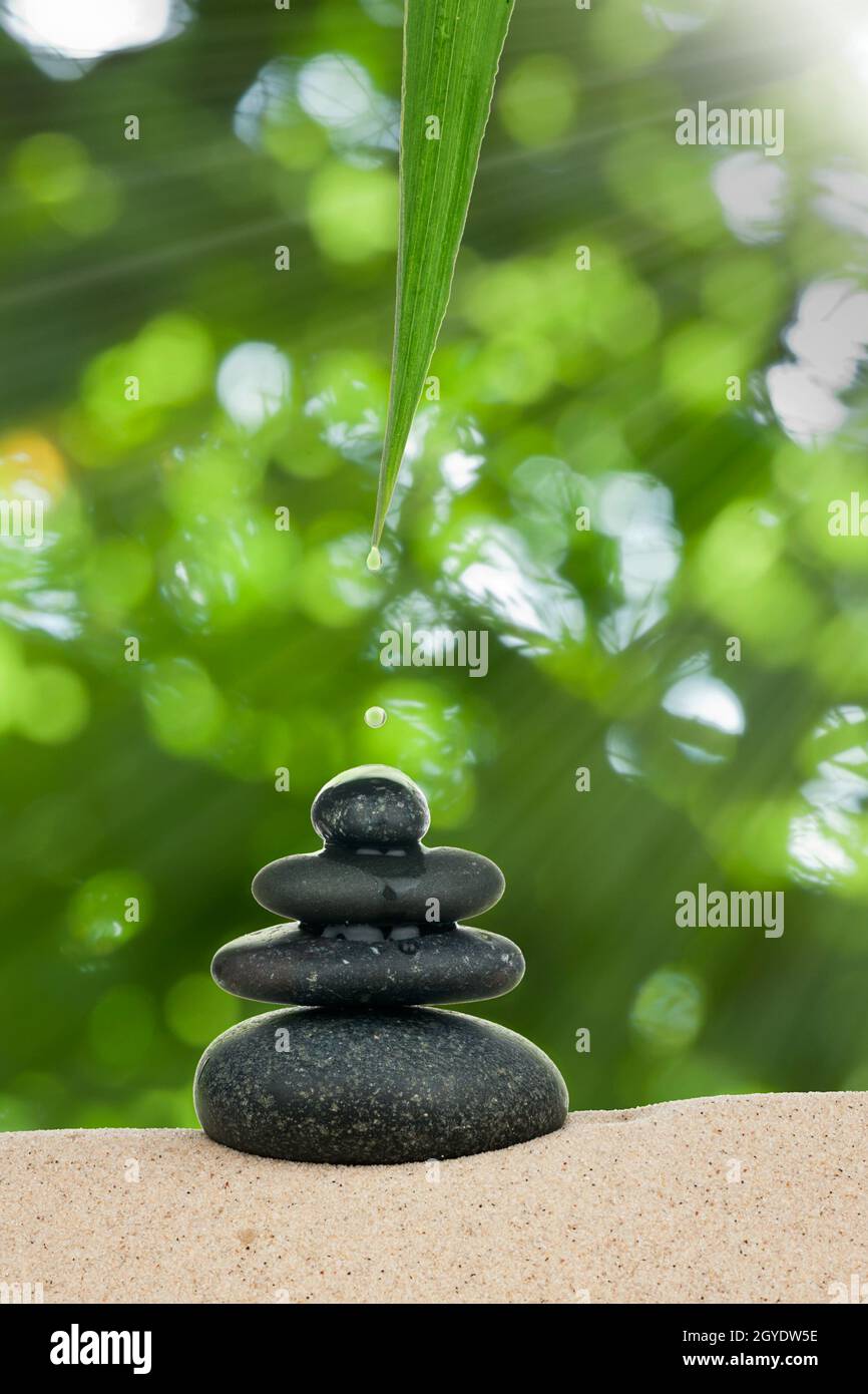 A drop of water drips on the pyramid stone, as background Stock Photo ...