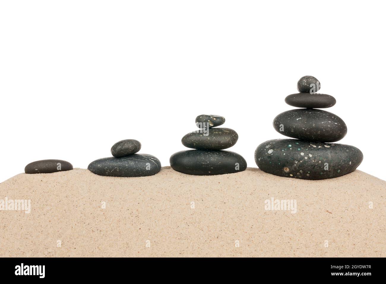 Four pyramids on the sand, isolated on white background Stock Photo - Alamy