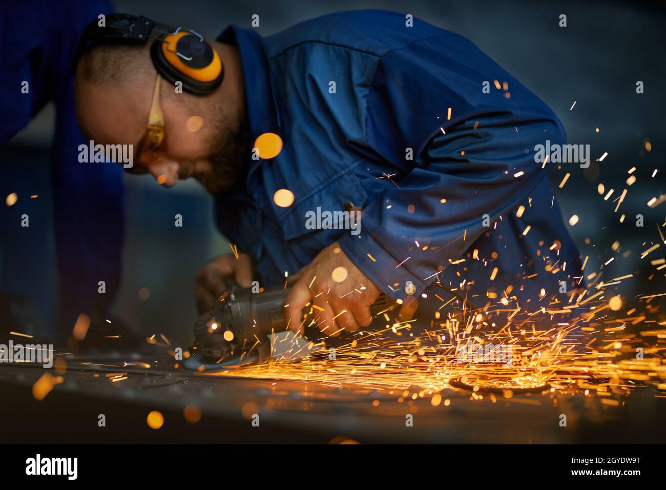 Man using grinding machine hi-res stock photography and images - Alamy