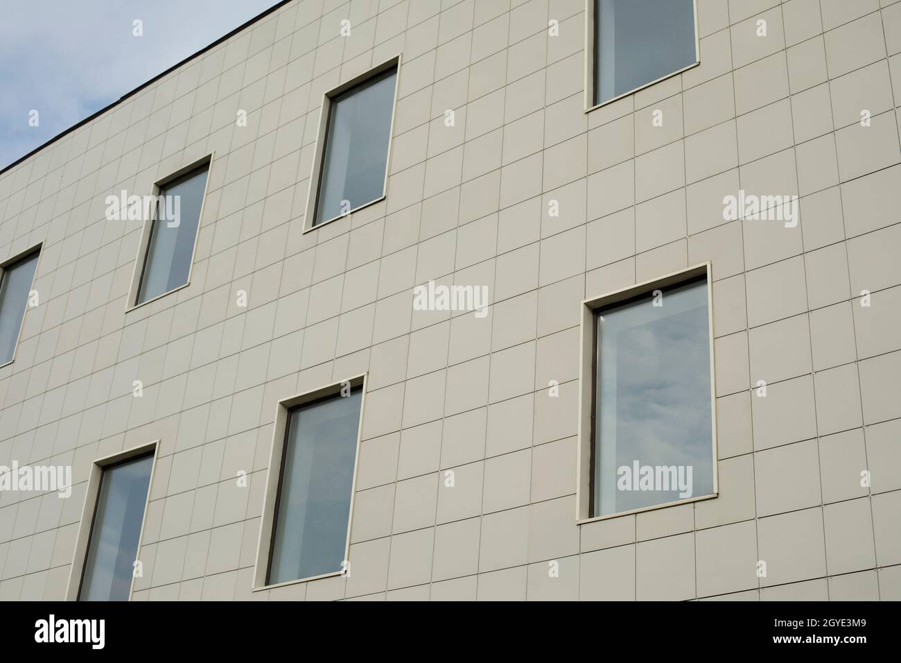 Windows in the office building. Facing panel in modern architecture ...