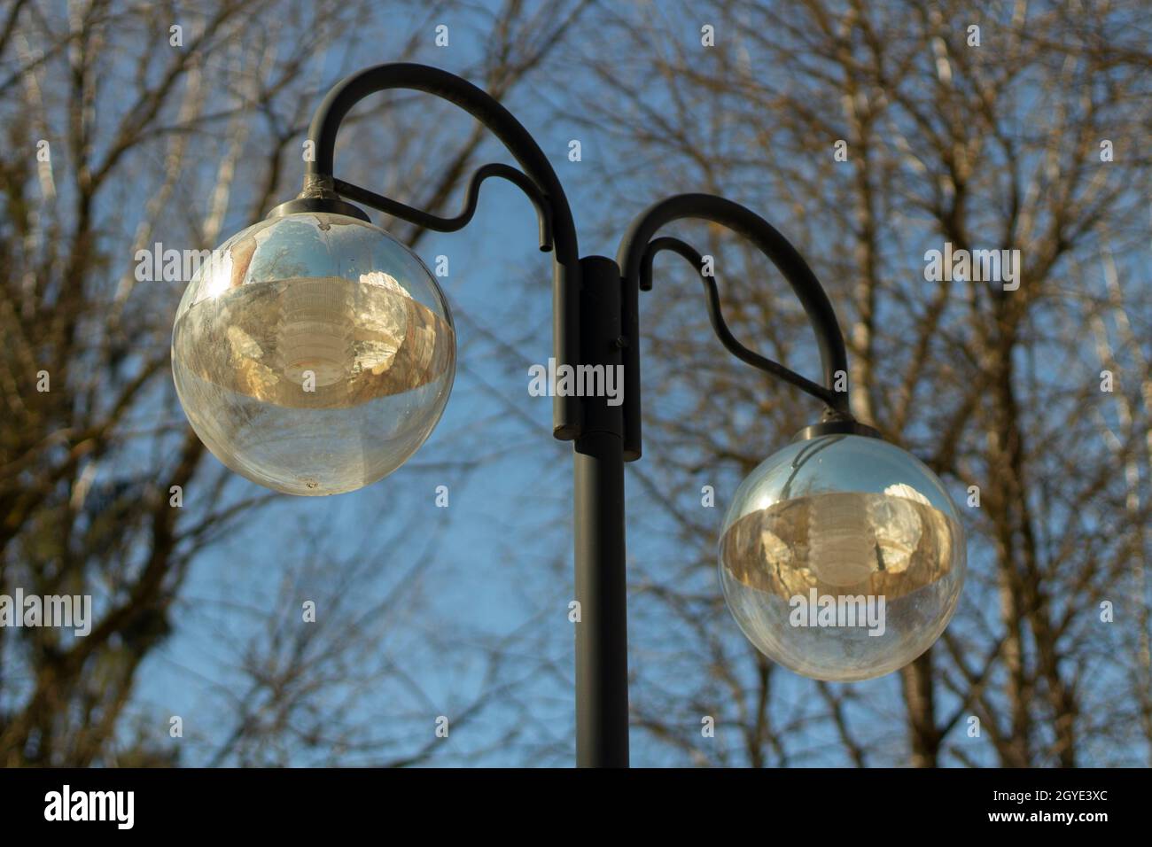 Street lighting during the day. Lighting in the park. Stand for light ...