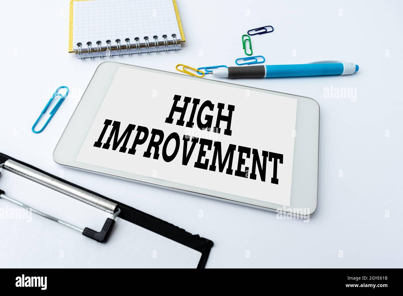 Hand writing sign High Improvement, Business concept addition or change ...