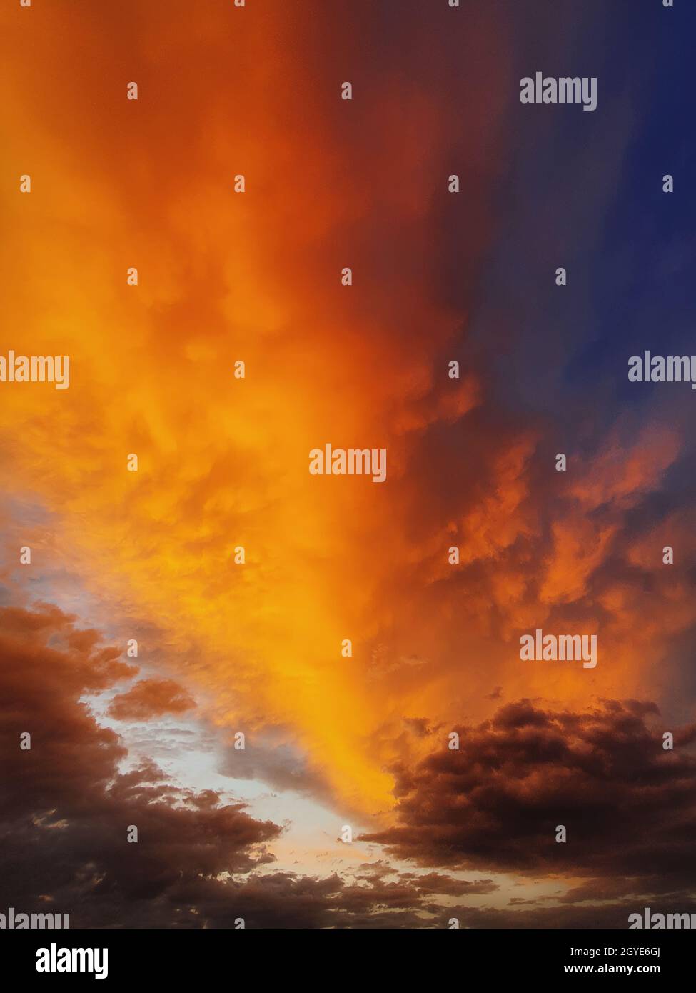 Colorful autumn sunset sky. Vertical background, abstract clouds shapes ...