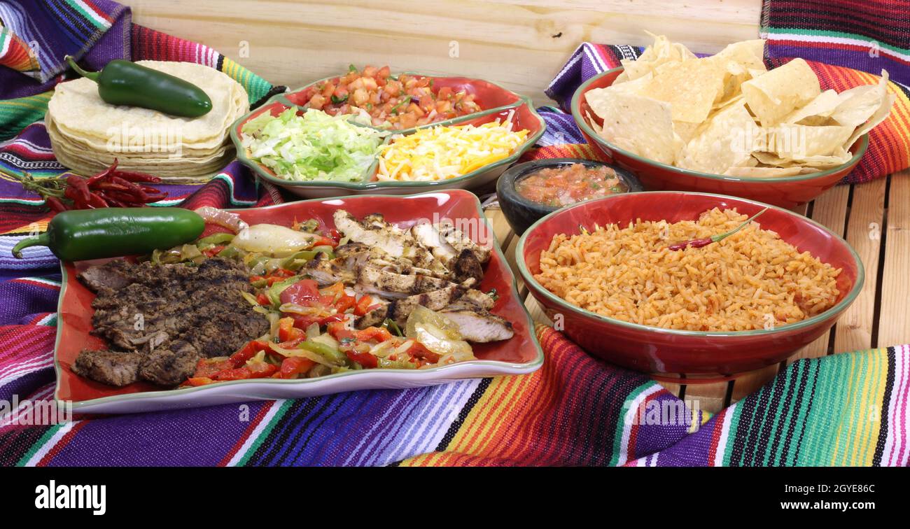 Fajita Dinner With Rice and Tortillas in Rustic Setting Stock Photo - Alamy
