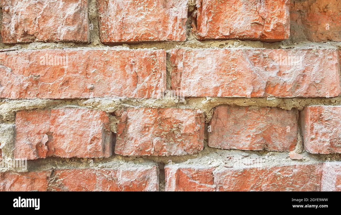 Red brick stone wall background texture Stock Photo - Alamy