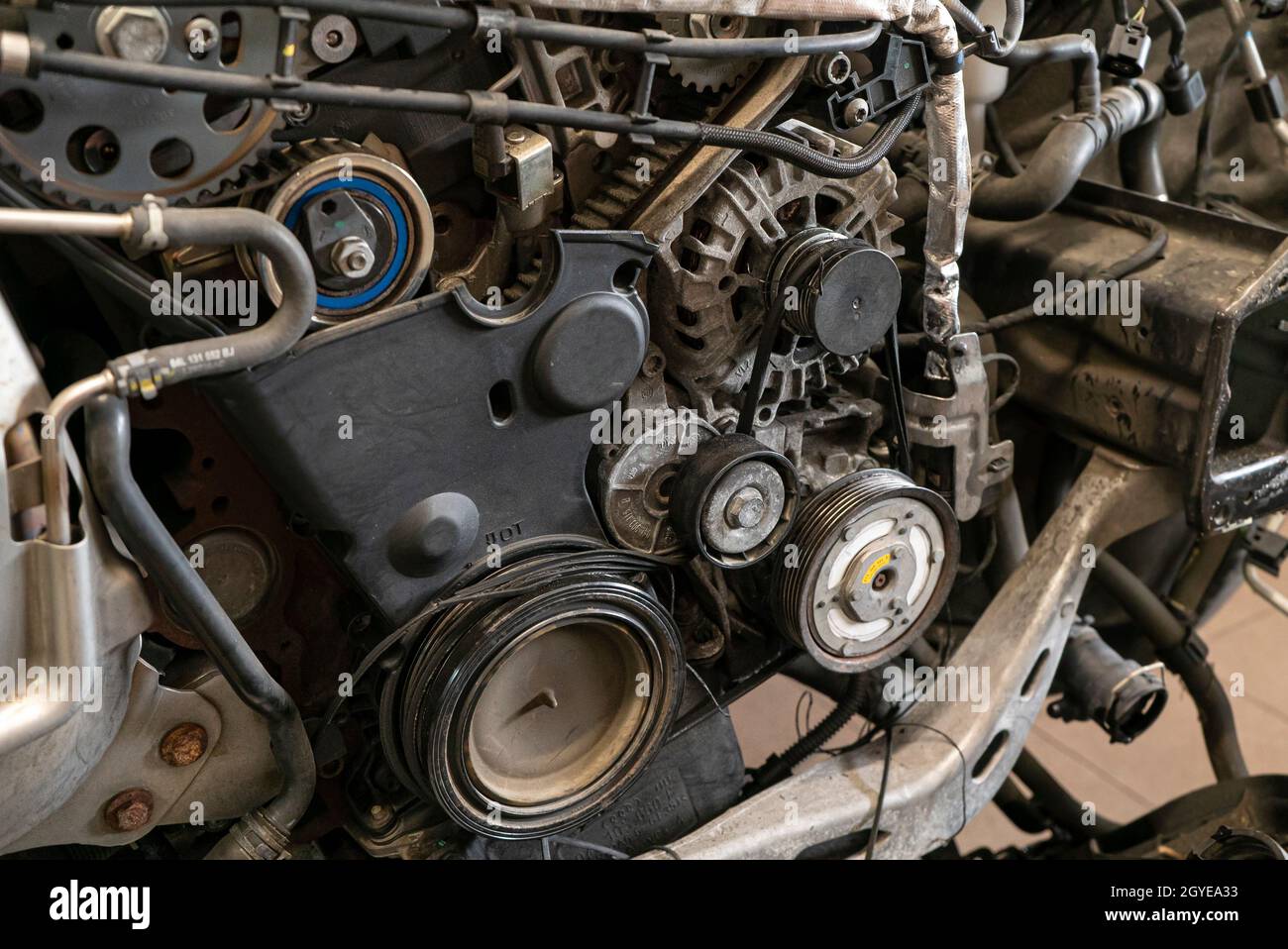 Detail of Broken belt in the car engine Stock Photo - Alamy