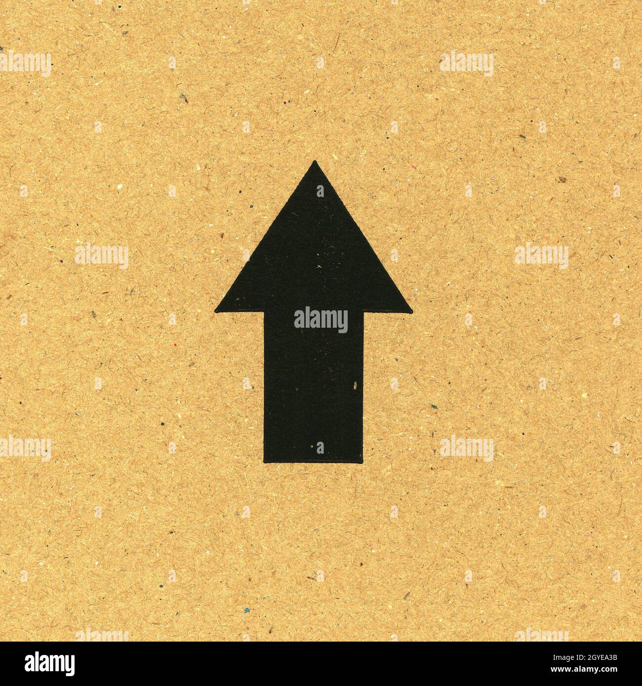 black up arrow on brown paper background Stock Photo - Alamy