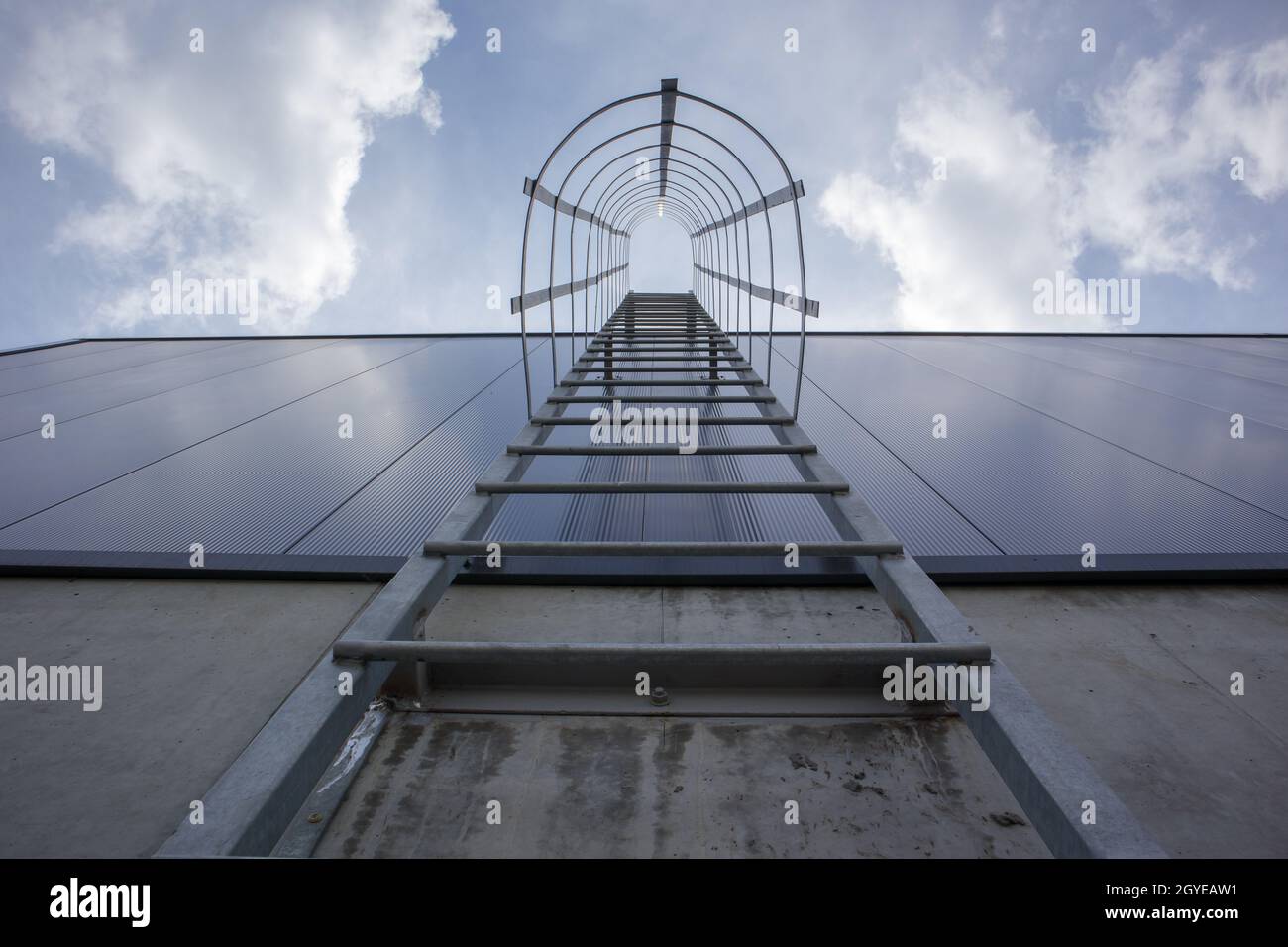 Fire escape on the industrial building above, bottom view. Stainless ...