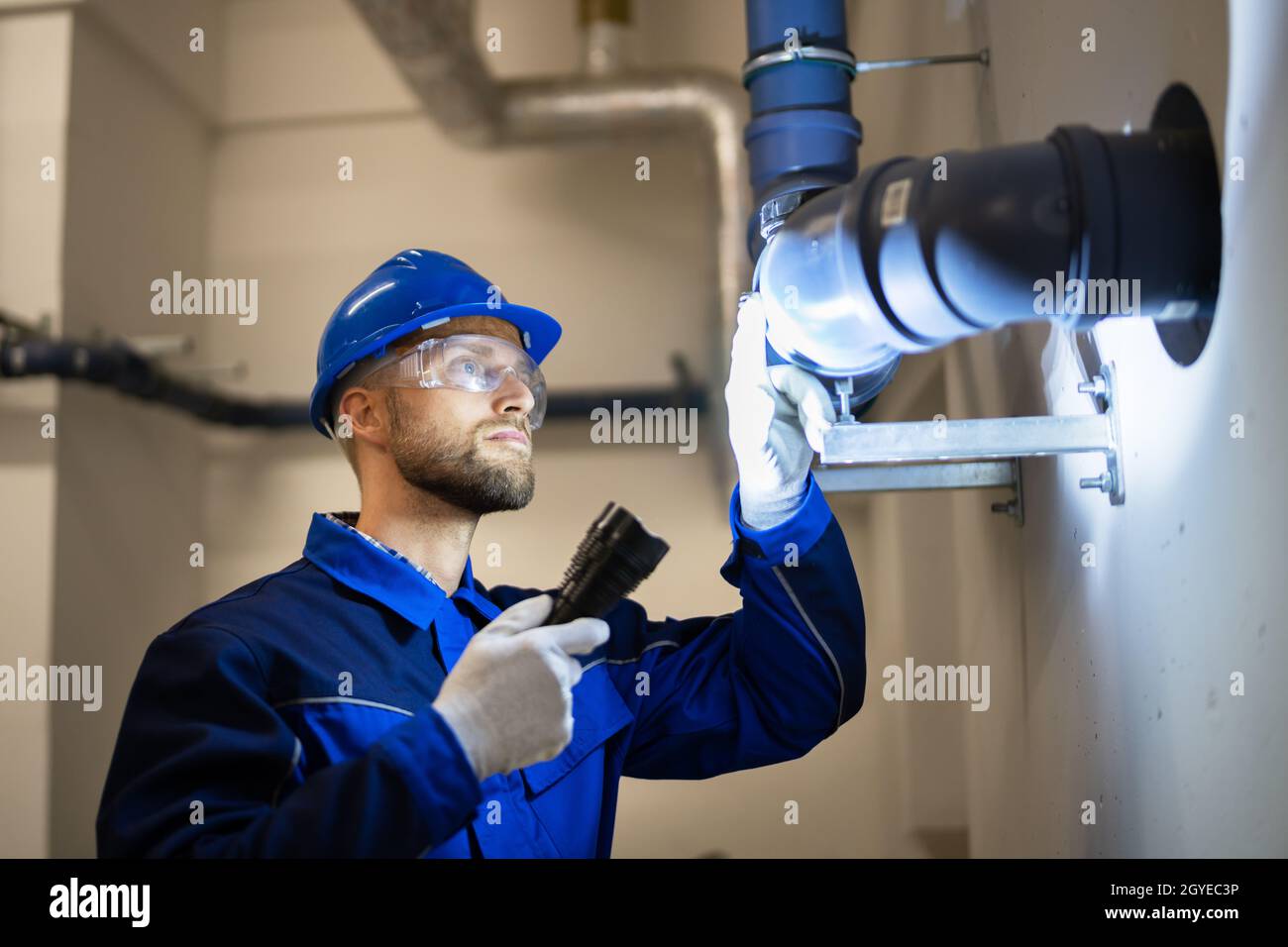 PVC Water Pipe Inspection By Construction Worker Stock Photo - Alamy