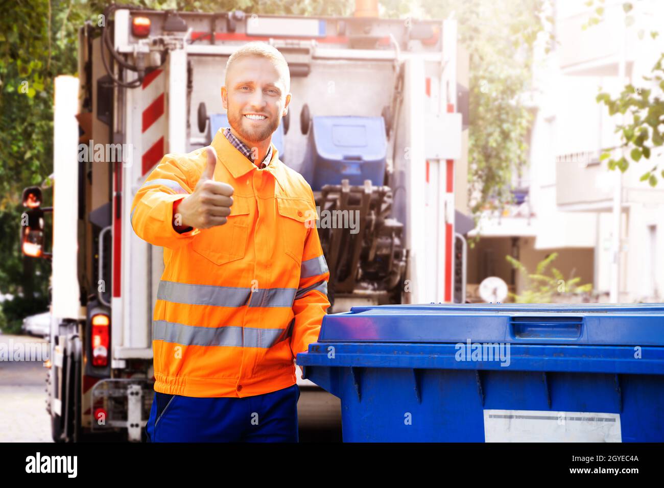 Garbage Removal Man Doing Trash And Rubbish Collection Stock Photo - Alamy