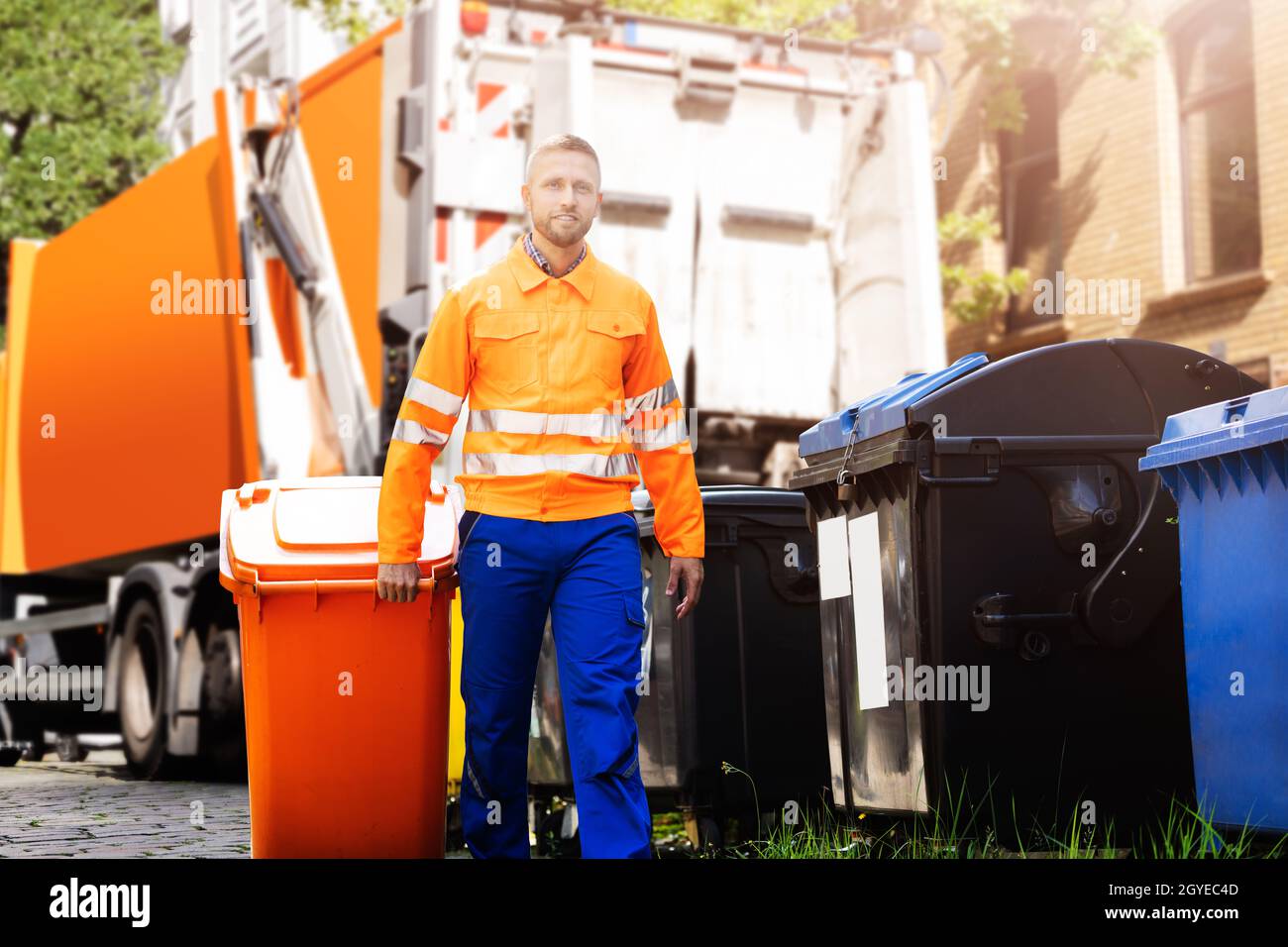 Garbage Removal Man Doing Trash And Rubbish Collection Stock Photo - Alamy