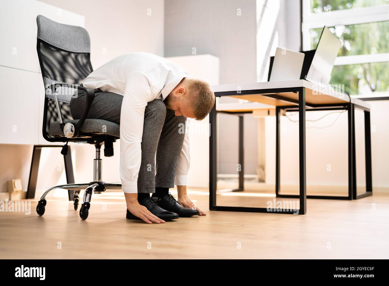Stretching Yoga Office Workout At Business Computer Desk Stock Photo ...