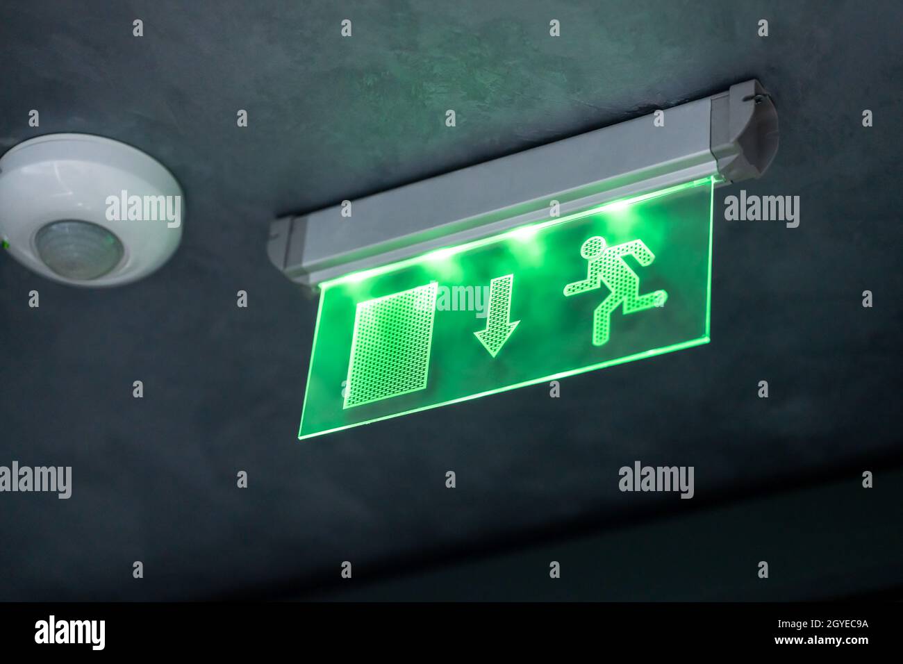 Emergency Evacuation Exit Sign. Fire Escape Guide Stock Photo - Alamy