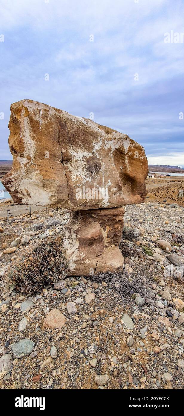 Vertical shot of stones stacked on top of each other on water and ...